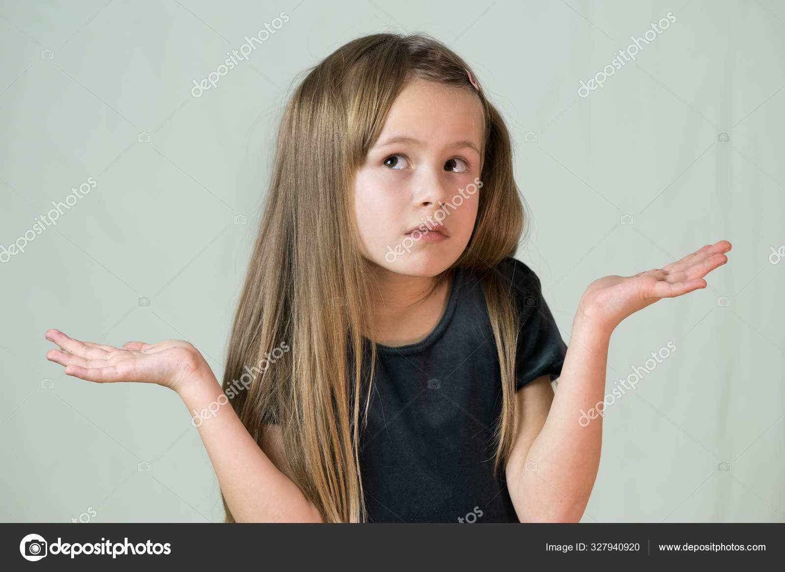 Child Shrugging Shoulders