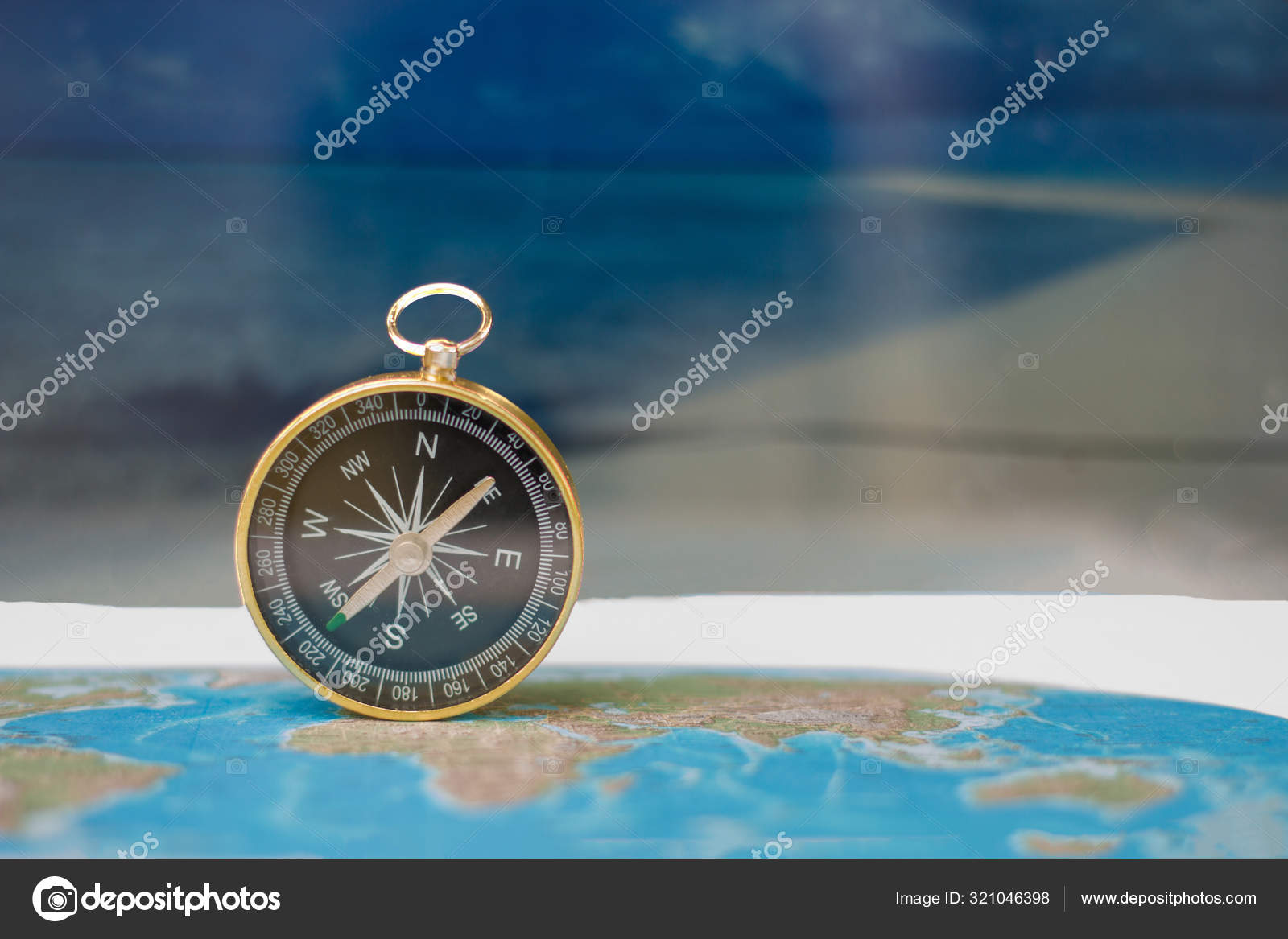 Magnetic compass on world map, concept of travel and destination Stock ...