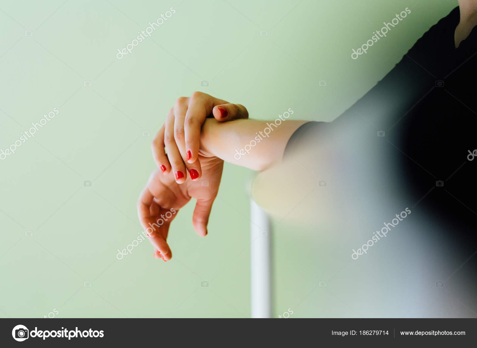 Elegant Beautiful Ballerina With A Perfect Body Doing Stretching