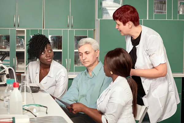 Multicultural Team Scientists Medics Test Lab Hospital Discussing Test ...