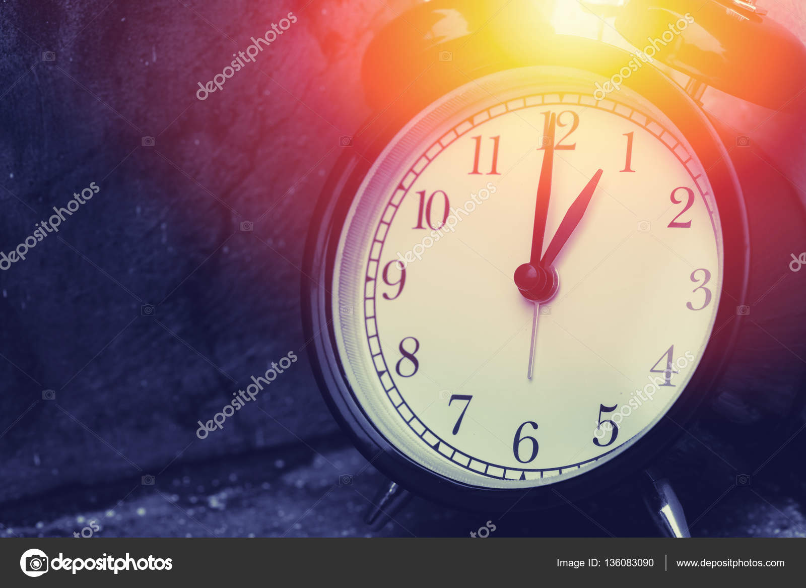 1 o'clock vintage clock at dark color tone with sun light memory time ...