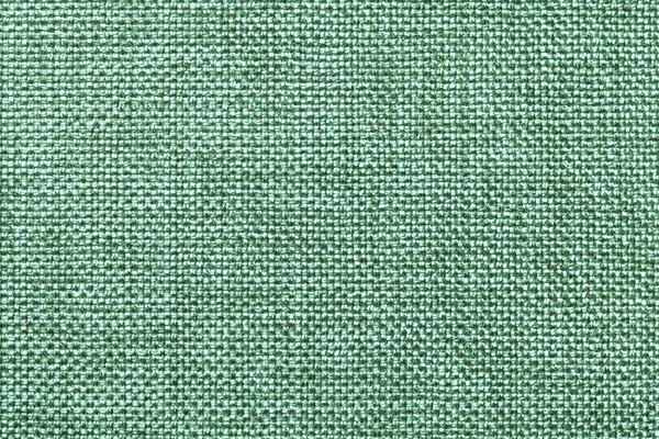 Light green textile background closeup. Structure of the fabric macro ...