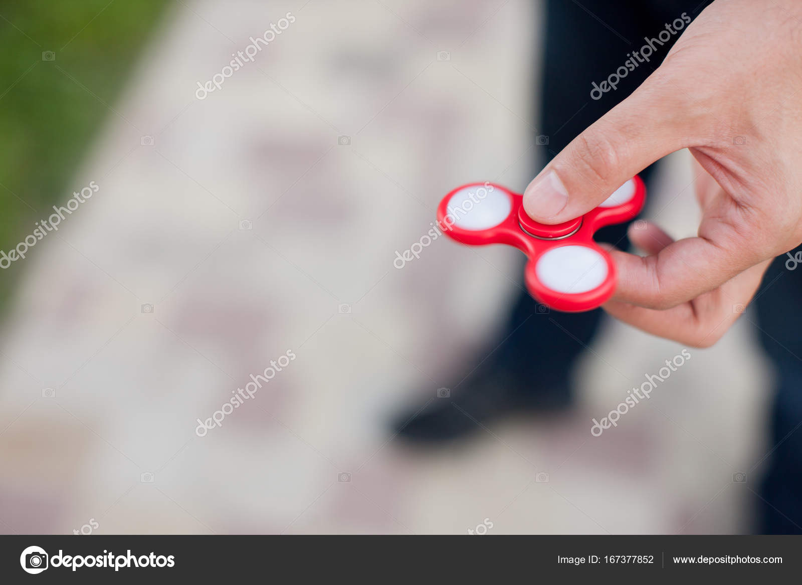 Man holding small red spinner — Stock Photo © luzgareva #167377852