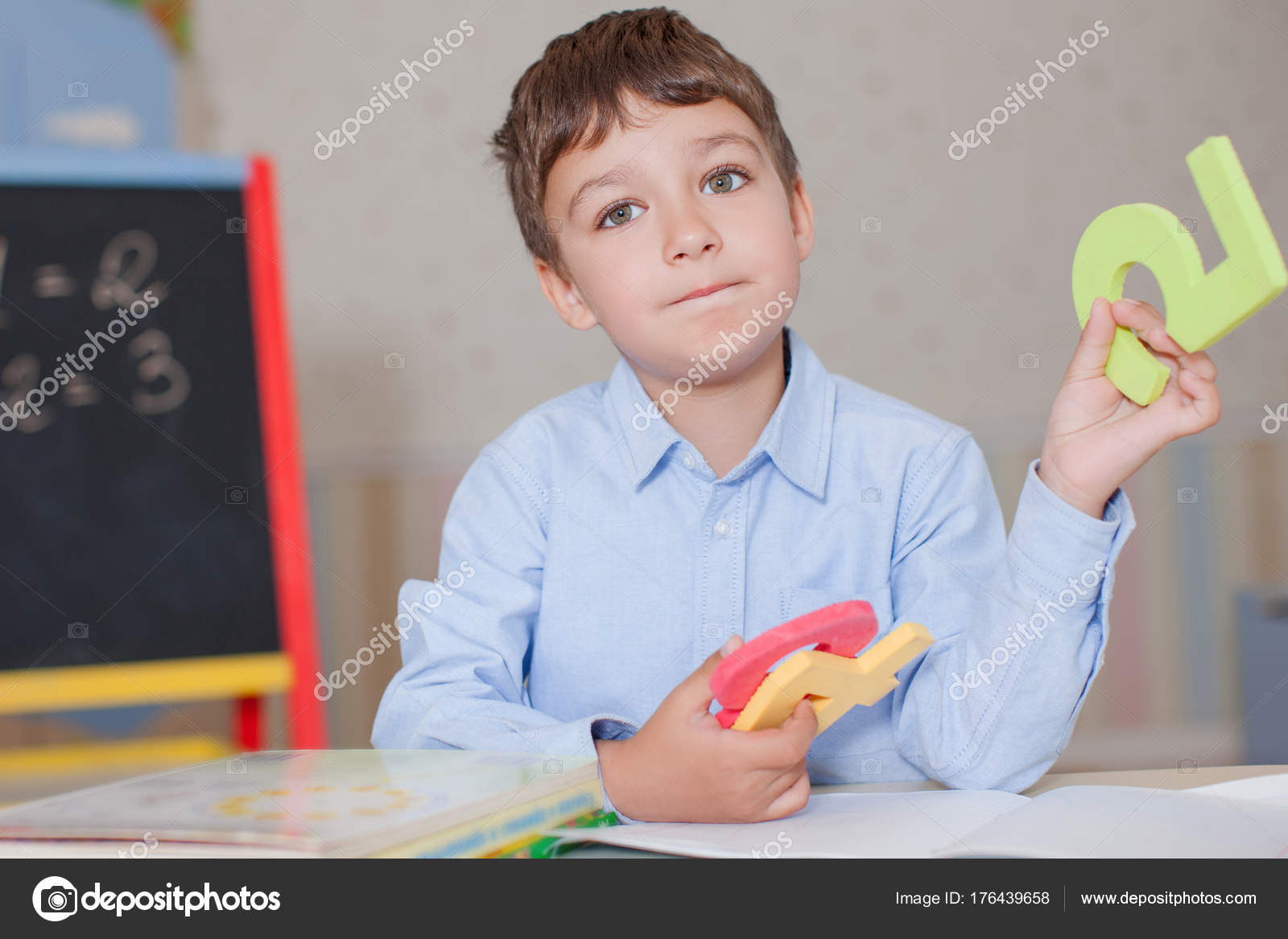 Cute Little Boy Wearing Blue Shirt Sitting Table Studying Wooden Stock ...