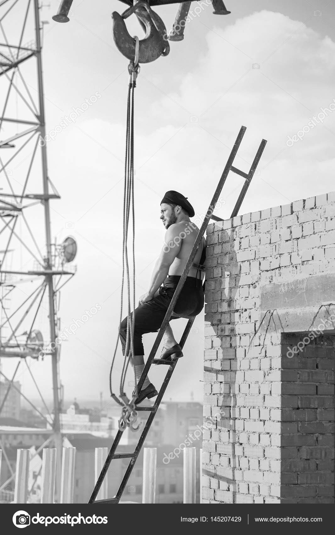 Worker Climbing Ladder