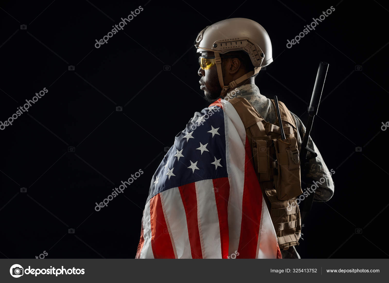 Soldier holding modern weapon and American flag on shoulder. — Stock ...