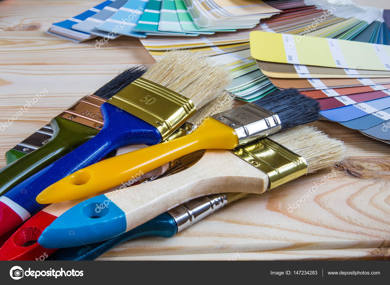 Painter and decorator work table with house project, color swatc Stock ...