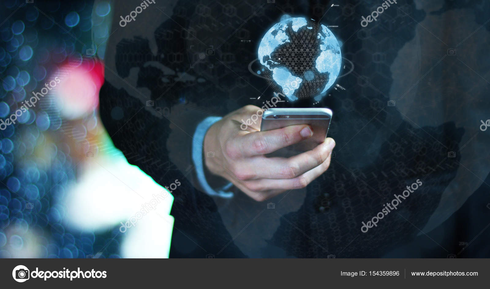 The young businessman navigating or sending email with smartphone with ...