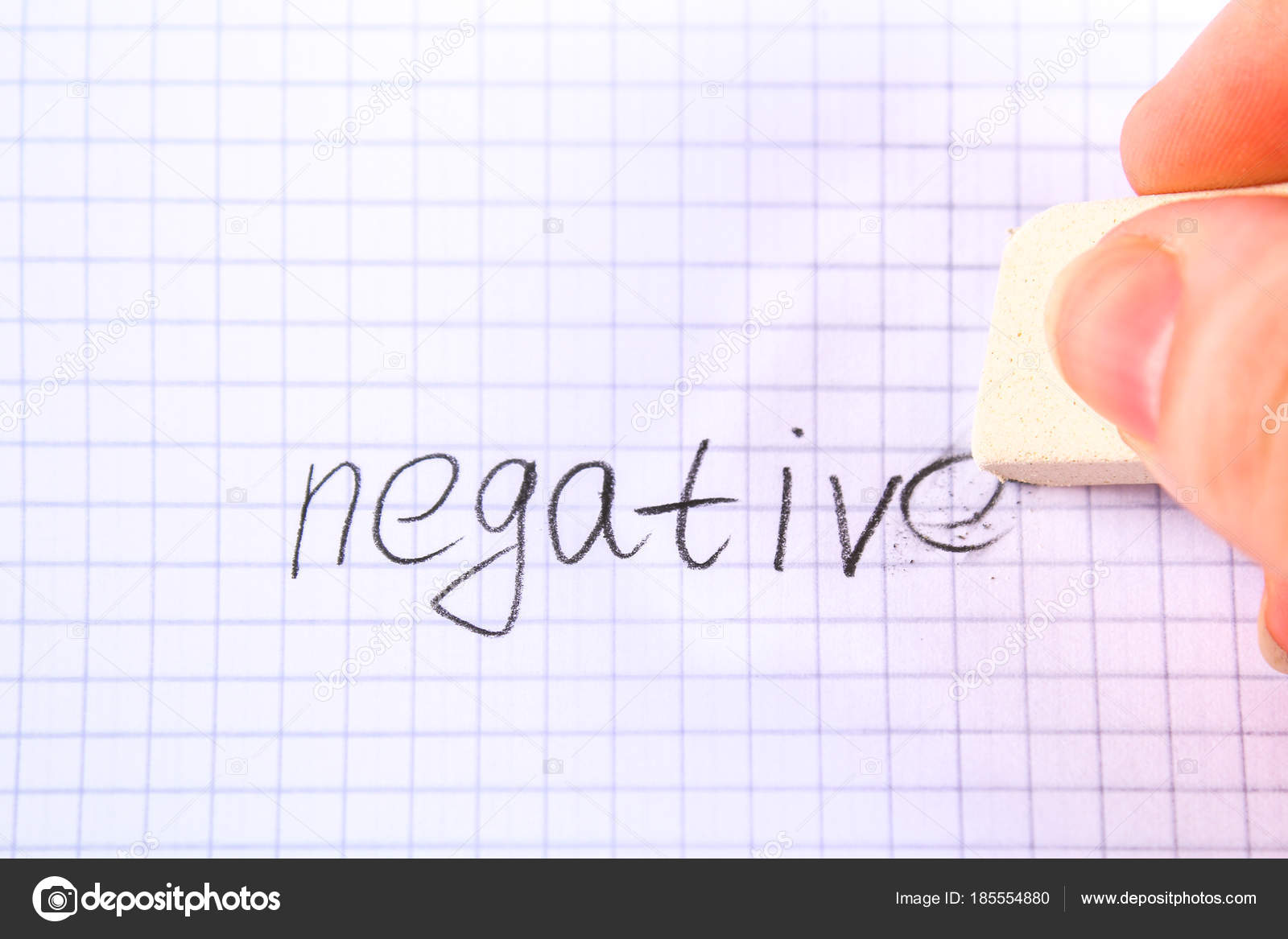 Eraser in hand erasing on the sheet in the cage word: negative. — Stock ...