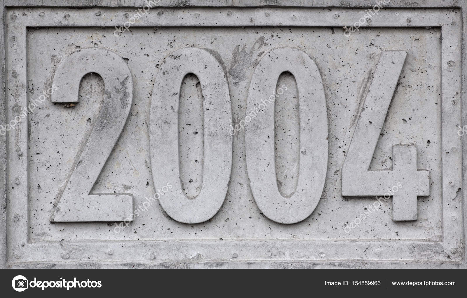 Concrete block with the year 2004 engraved — Stock Photo © jojoo64 ...