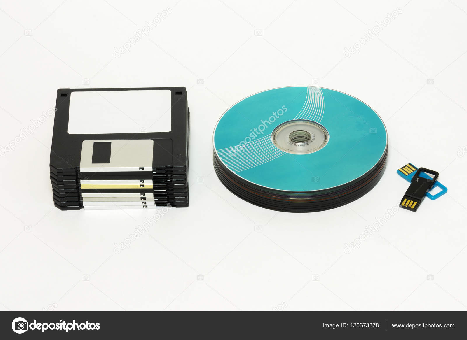 Floppy disks, CD / DVD disk and USB flash on a white background Stock ... Floppy disks, CD / DVD disk and USB flash on a white background Stock ...