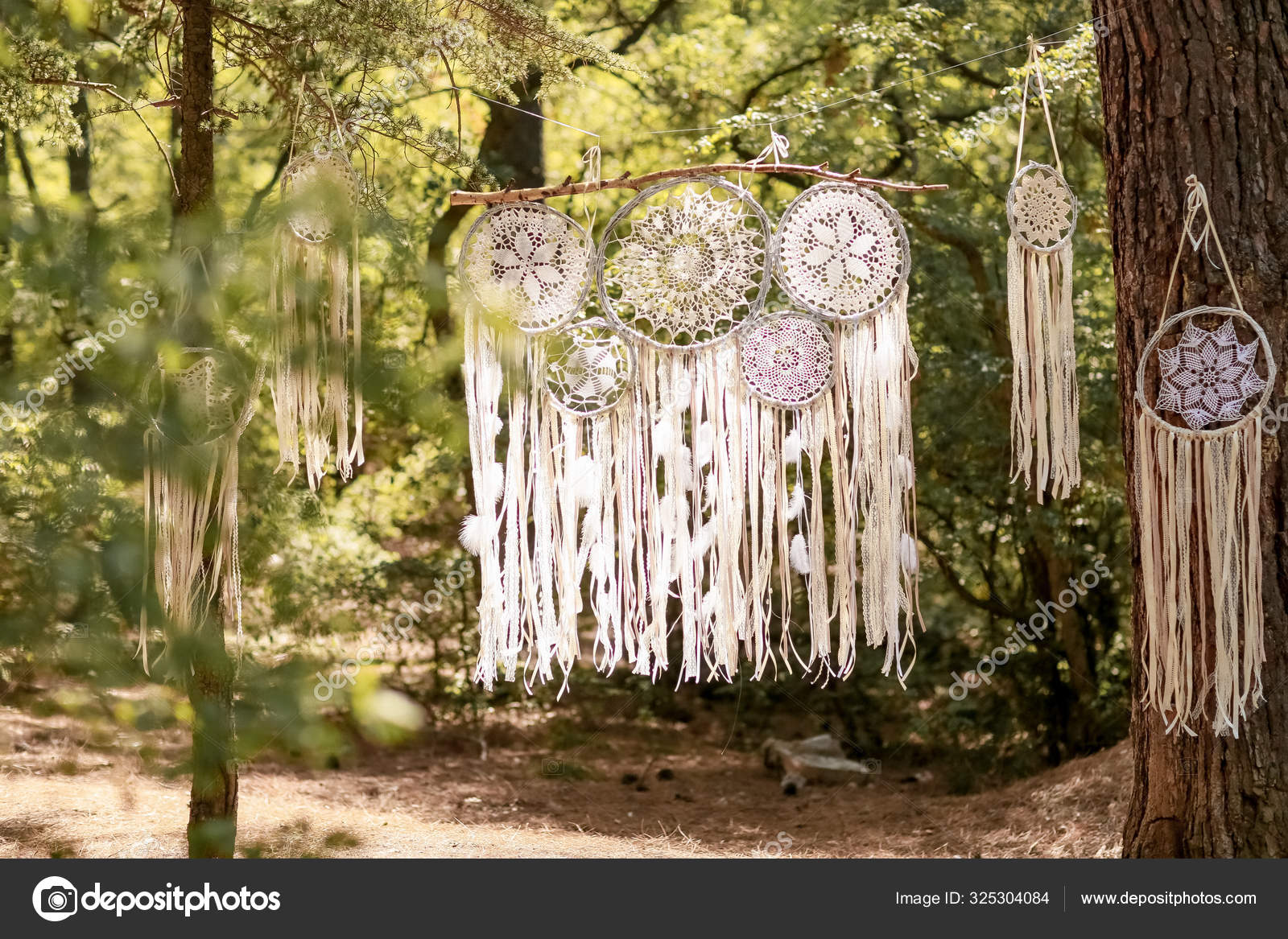 Close up dream catchers hanging on a tree in the forest — Stock Photo ...