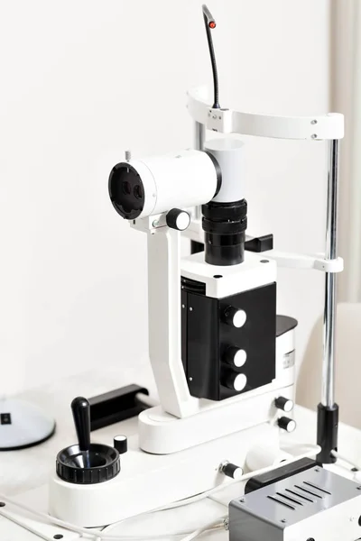 Modern eye testing device standing in the lab. Tonometer in ...
