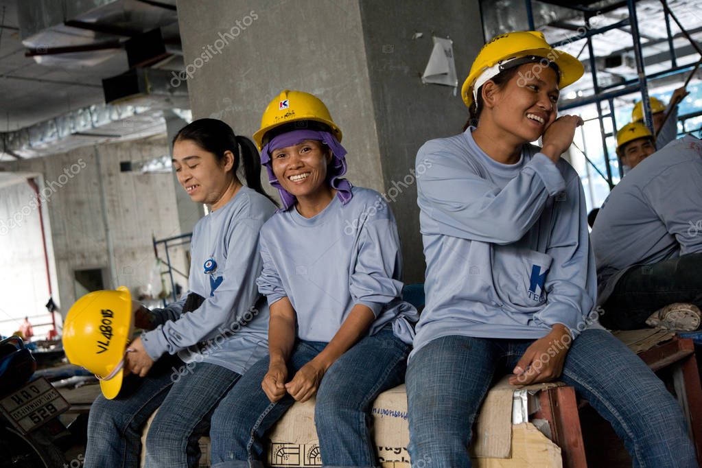 Bangkok, Thailand, Workers have a rest during lunch time – Stock ...