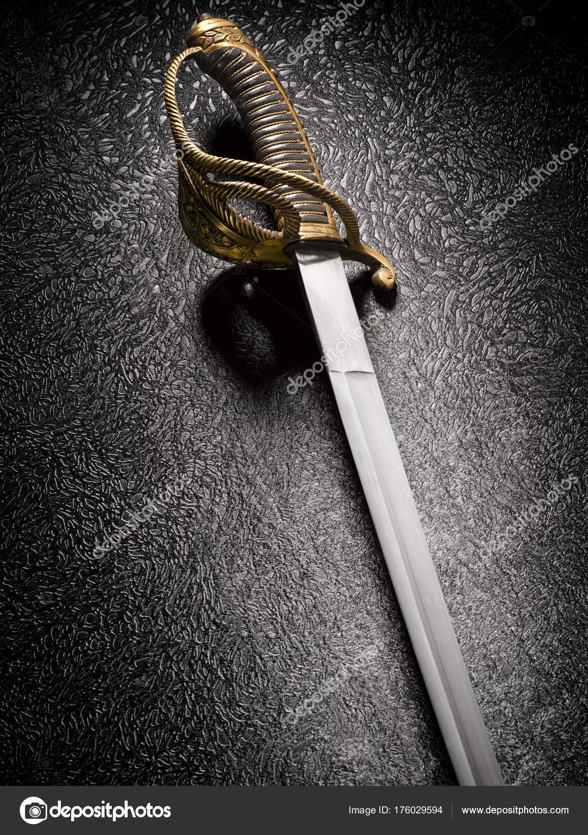 An ancient saber with a beautiful handle. Stock Photo by ©accent-p.mail ...