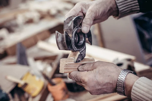 The carpenter makes frames. — Stock Photo © accent-p.mail.ru #182631788