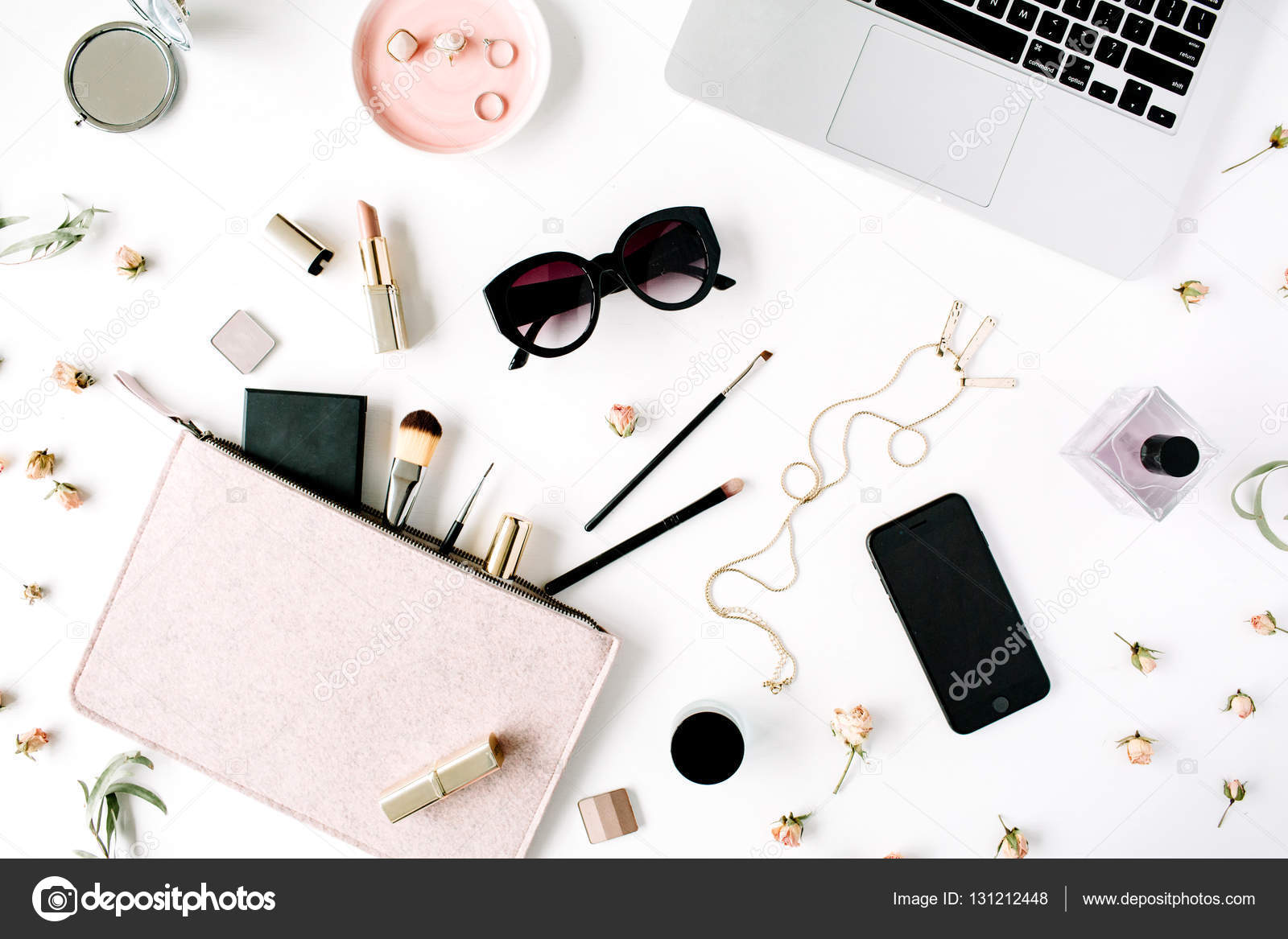 Feminine desk workspace with laptop Stock Photo by ©maximleshkovich ...