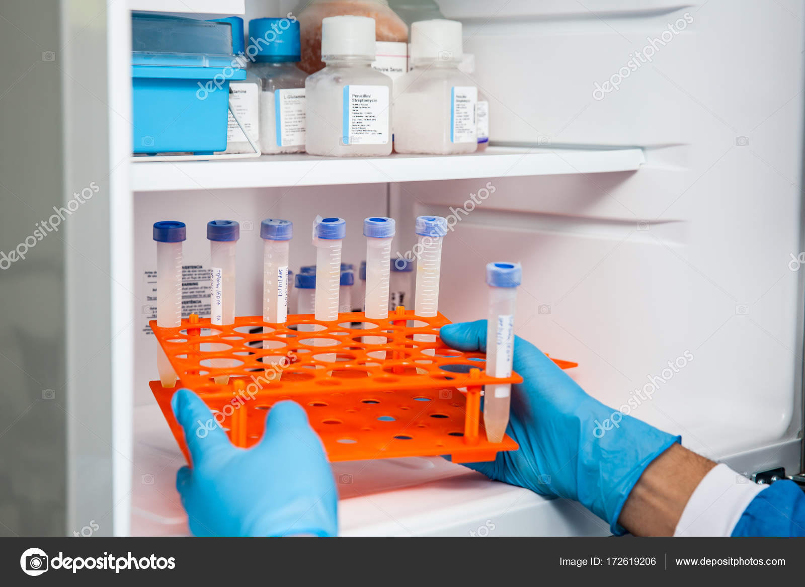 Male scientist and laboratory freezer Stock Photo by ©anamejia18 172619206