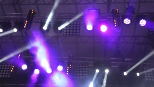 Lighting the big scene. Flashing lights in different colors move in ...