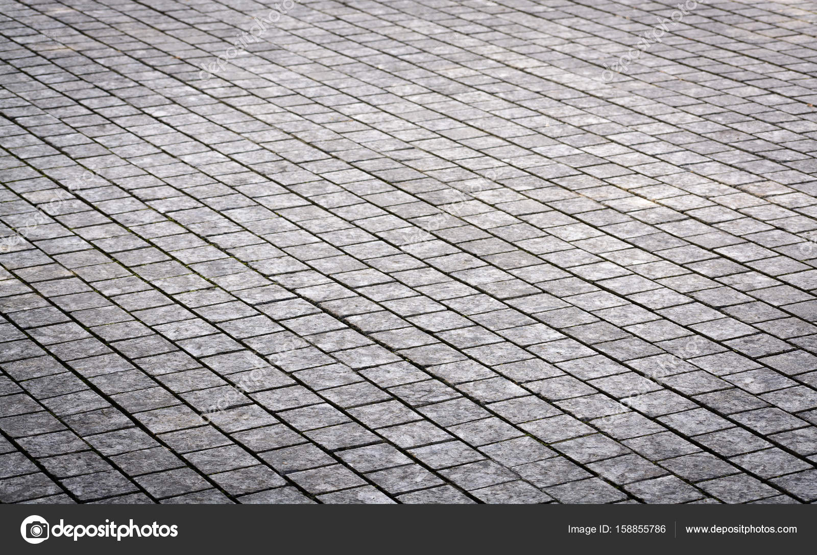 Stone pavement texture. Granite cobblestoned pavement background ...