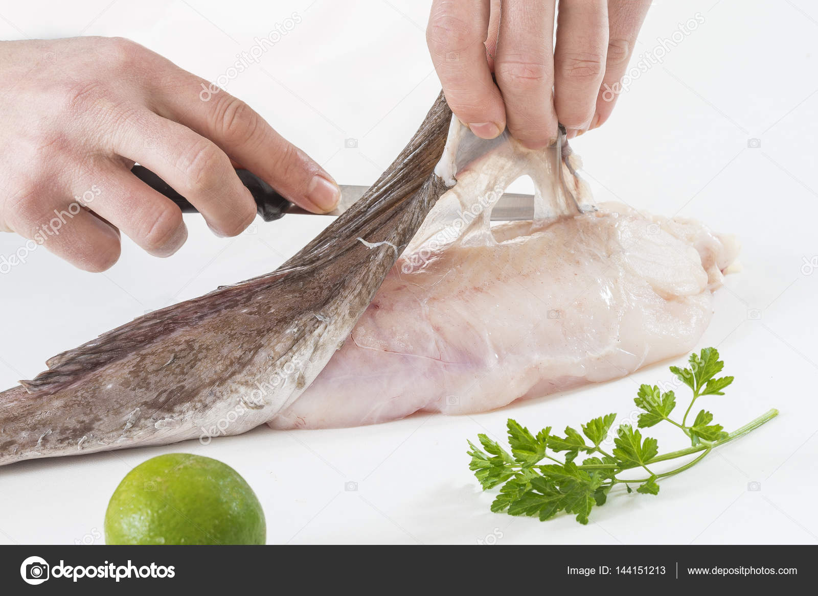 Chief preparing monkfish — Stock Photo © JPCPROD #144151213