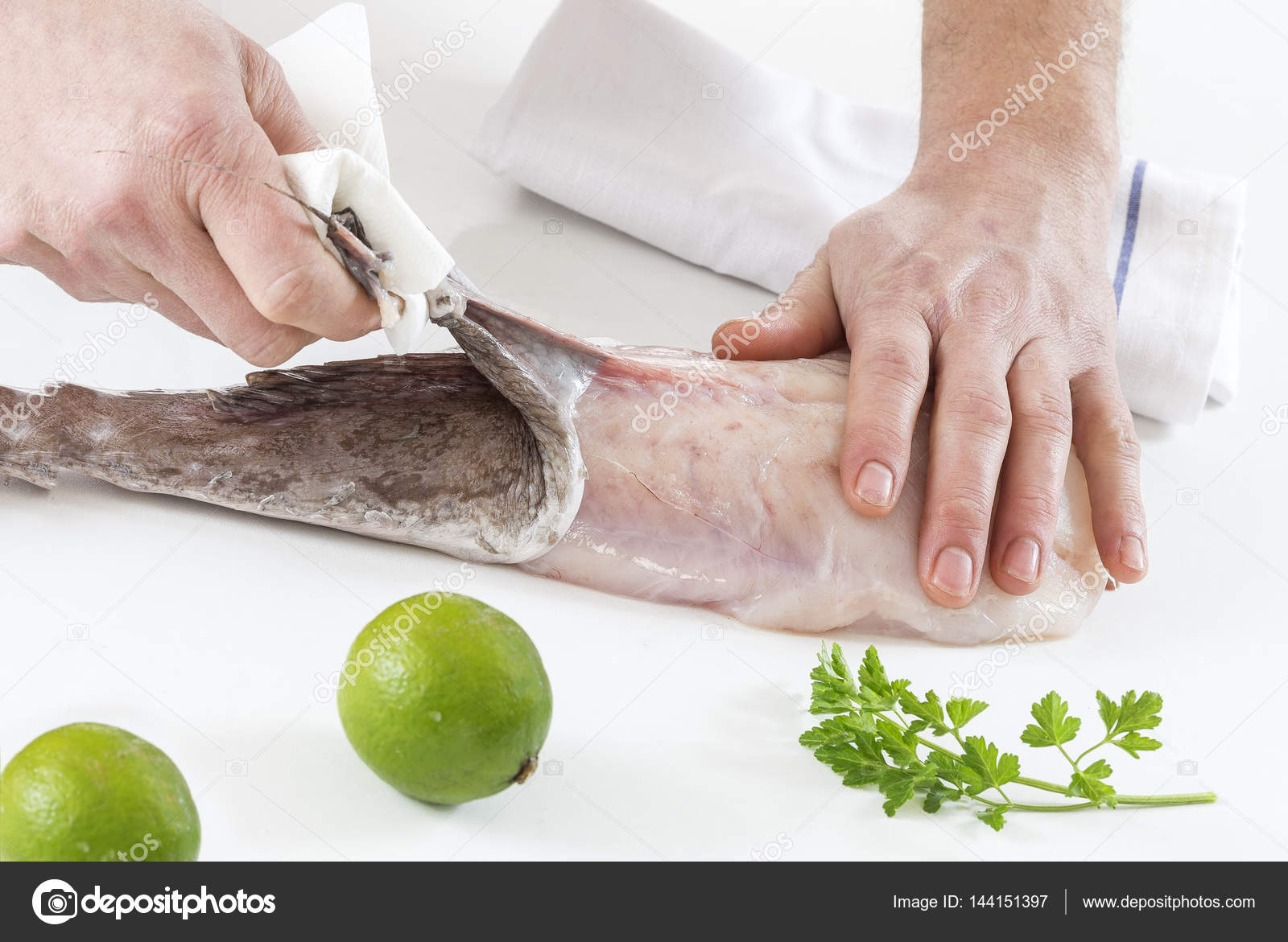 Chief preparing monkfish — Stock Photo © JPCPROD #144151397