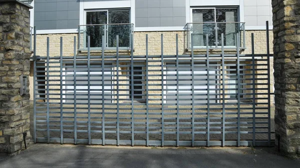 Fence gates house Stock Photos, Royalty Free Fence gates house Images ...