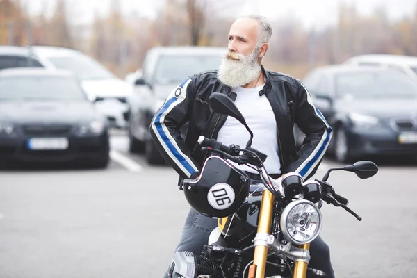 Handsome man white beard on a motorcycle Stock Photos, Royalty Free ...