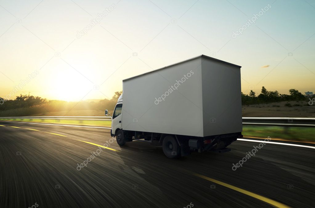 Delivery truck on road Stock Photo by ©jamesteohart 126069448