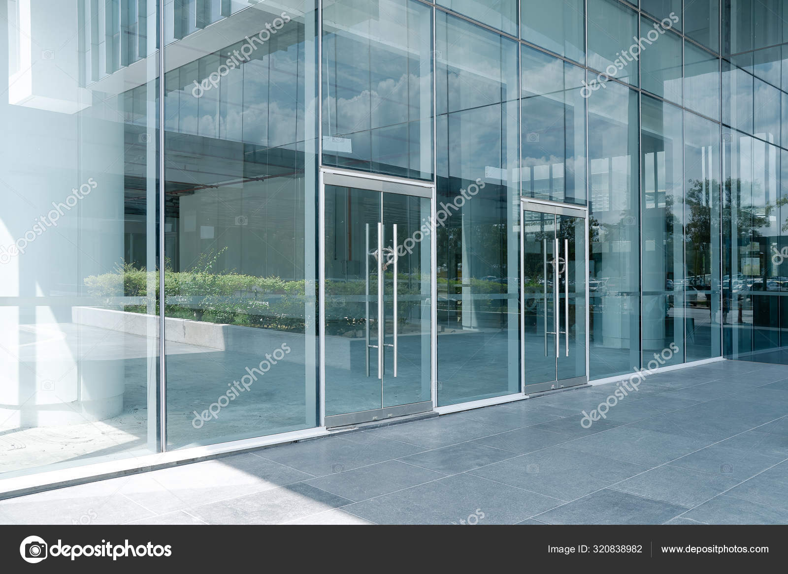 Empty ground in front of modern buildings . Stock Photo by ...