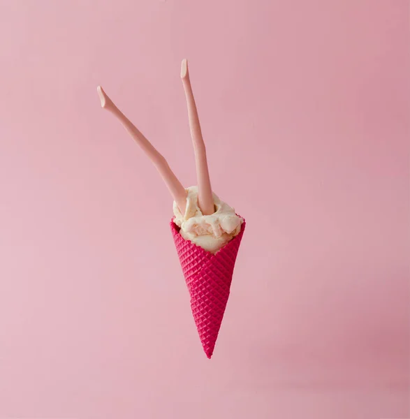 Doll legs in ice cream cone Stock Photo by ©Zamurovic 159638356