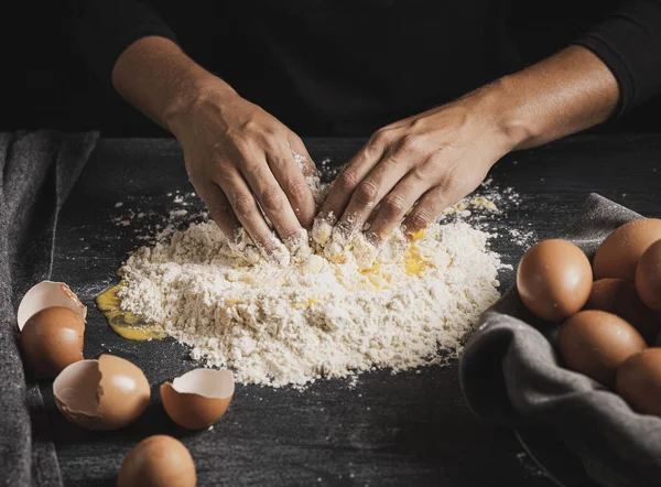 Beat flour and kitchen utensils, a baking dish, a rolling pin with eggs ...