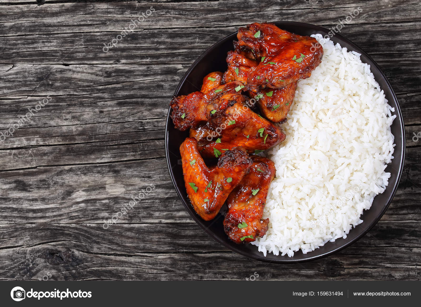 Rice with delicious glazed chicken wings — Stock Photo © myviewpoint ...