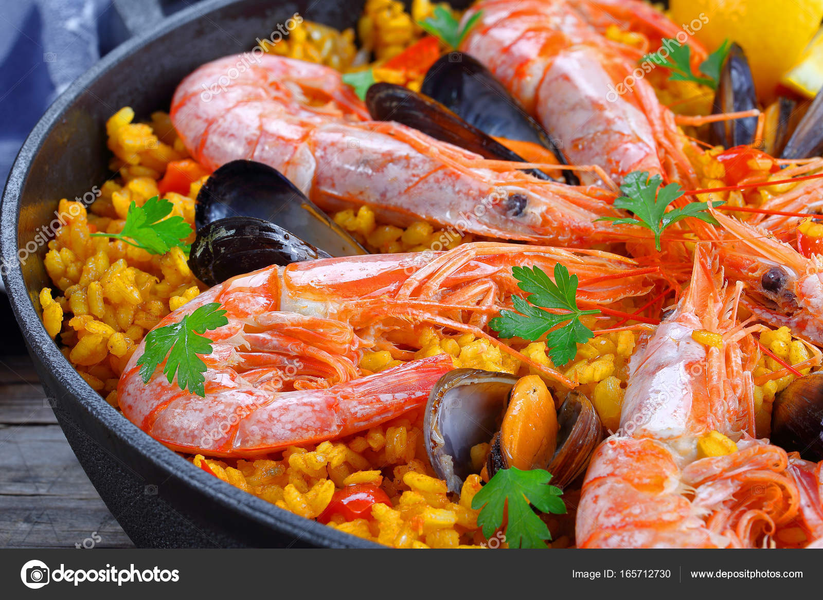 Seafood paella with king prawns, mussels Stock Photo by ©myviewpoint ...
