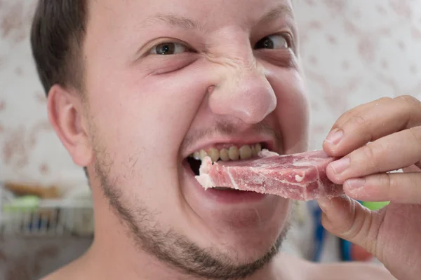 Man eating meat Stock Photos, Royalty Free Man eating meat Images ...
