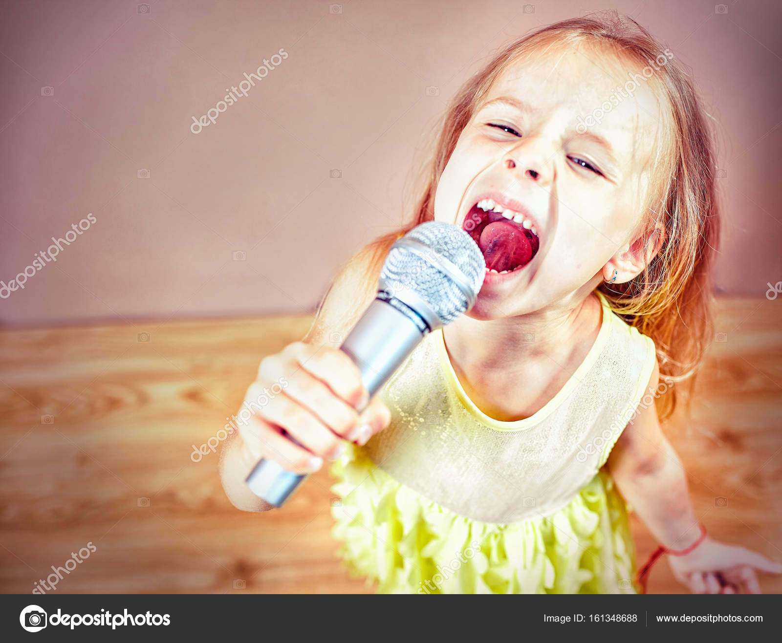 The child sings into the microphone Stock Photo by ©6okean.gmail.com ...