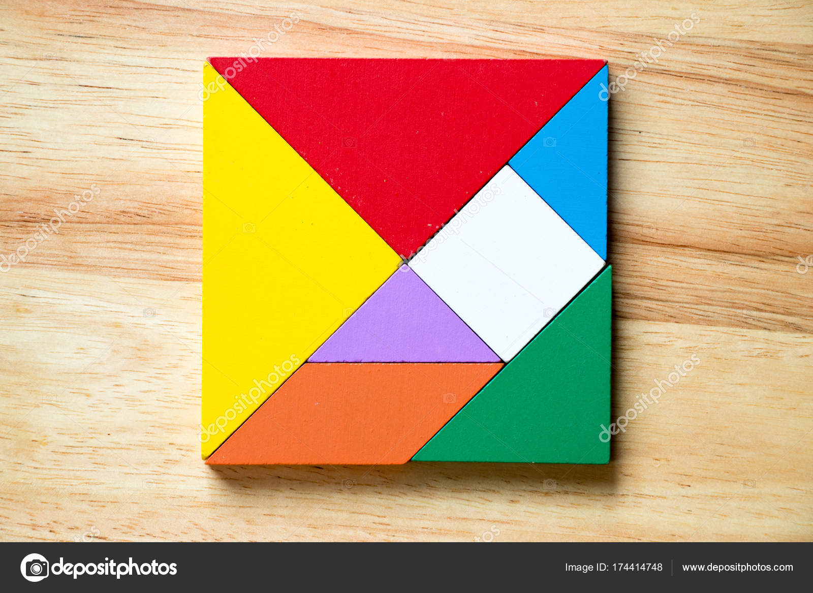 Color tangram puzzle in square shape on wood background Stock Photo by ...