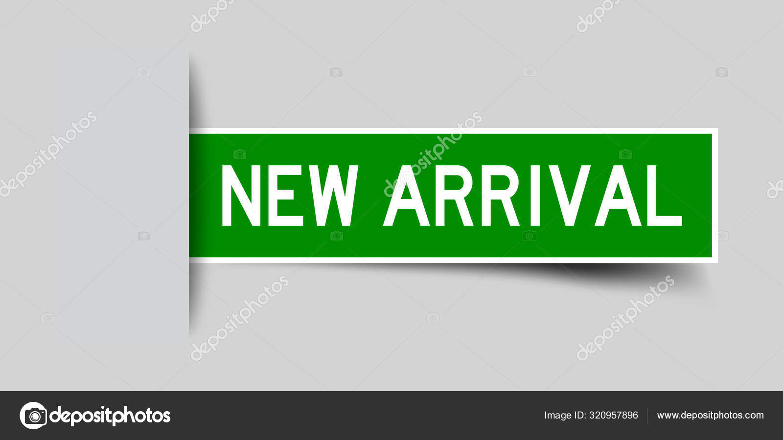 Label sticker green color in word new arrival that inserted in gray ...