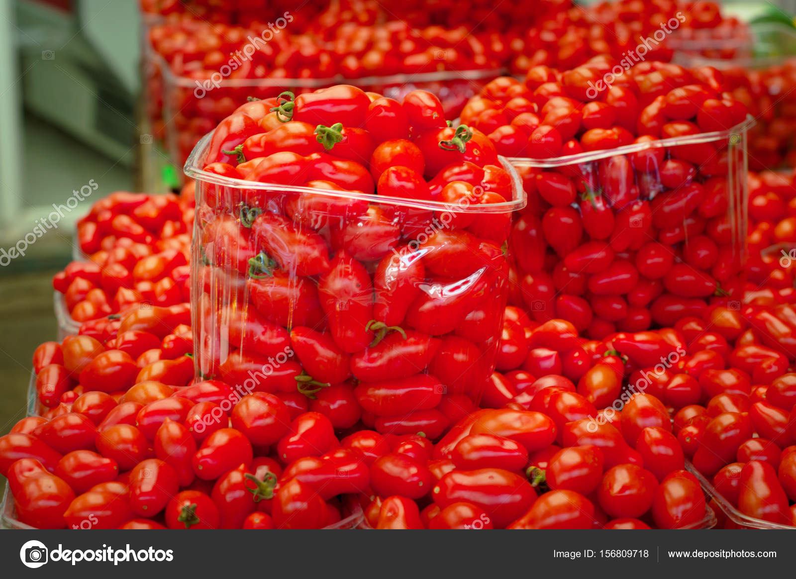 Fresh organic mini tomatoes at outdoor market. Top view. Close-up ...