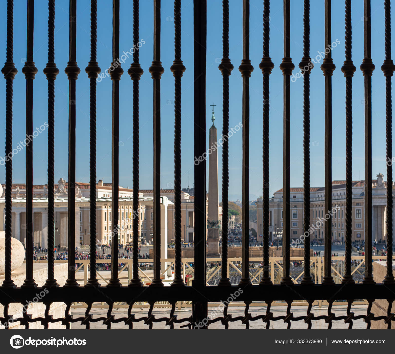 Iron gate and arch at entrance of Saint Peters Basilica at St. Peters ...