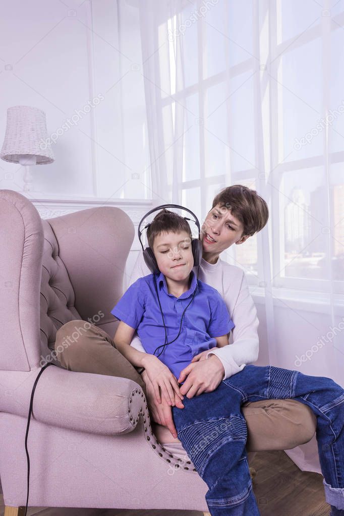 Mother Screaming To Her Son While He Listening Music And Doesnt Listen