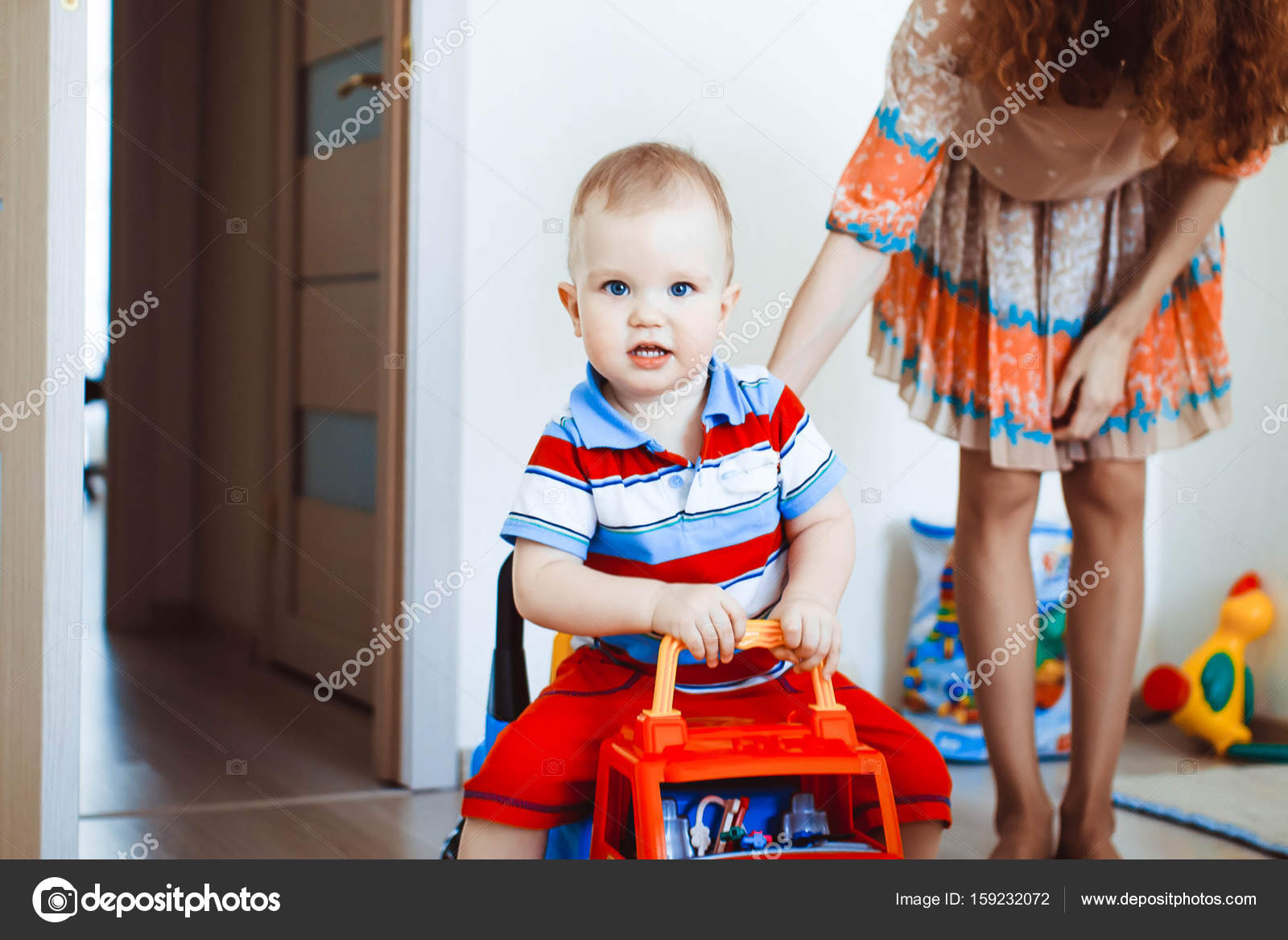 Little boy is riding a car Stock Photo by ©Venerala 159232072