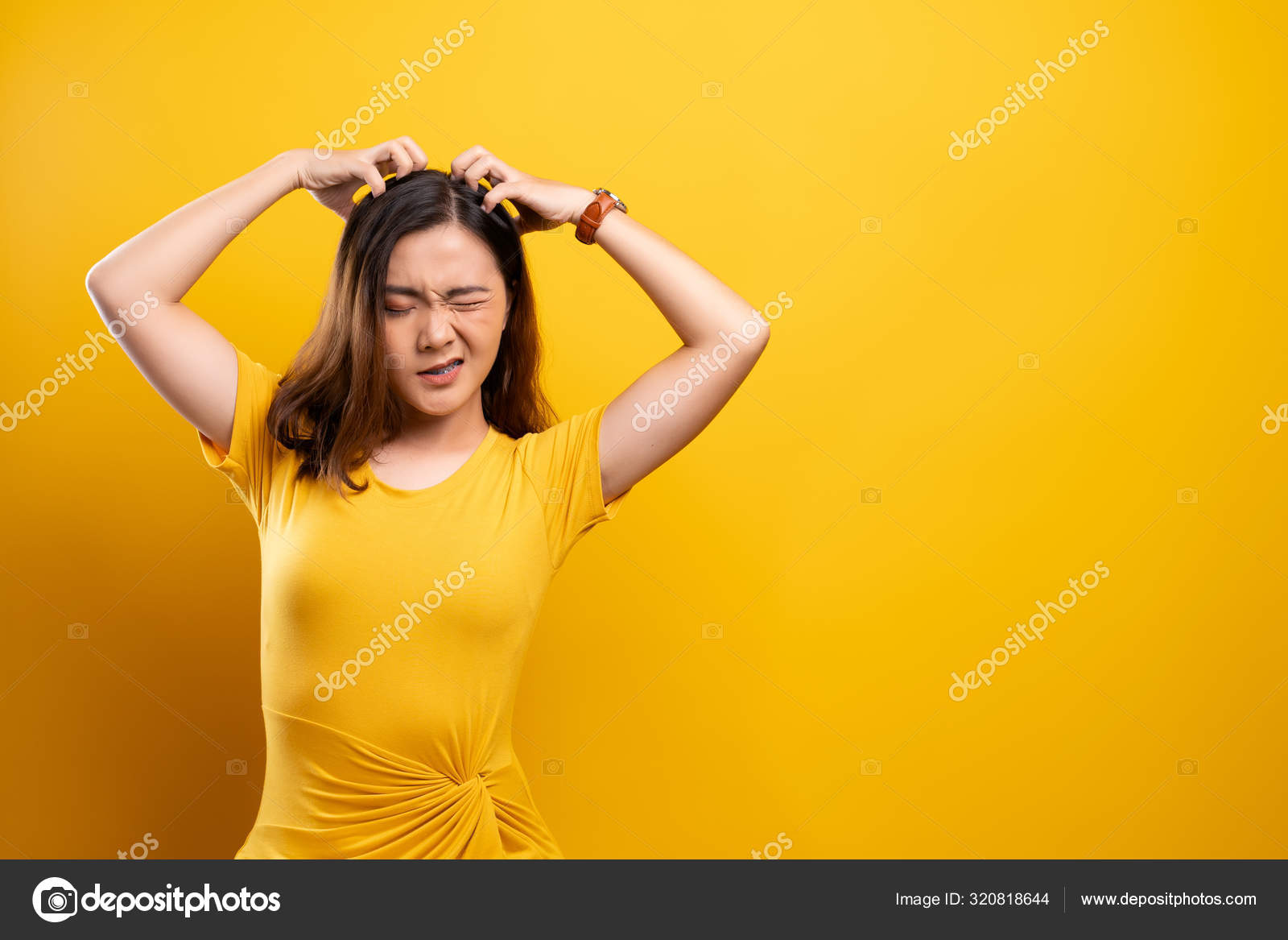 Woman scratching her head Stock Photo by ©Champja 320818644