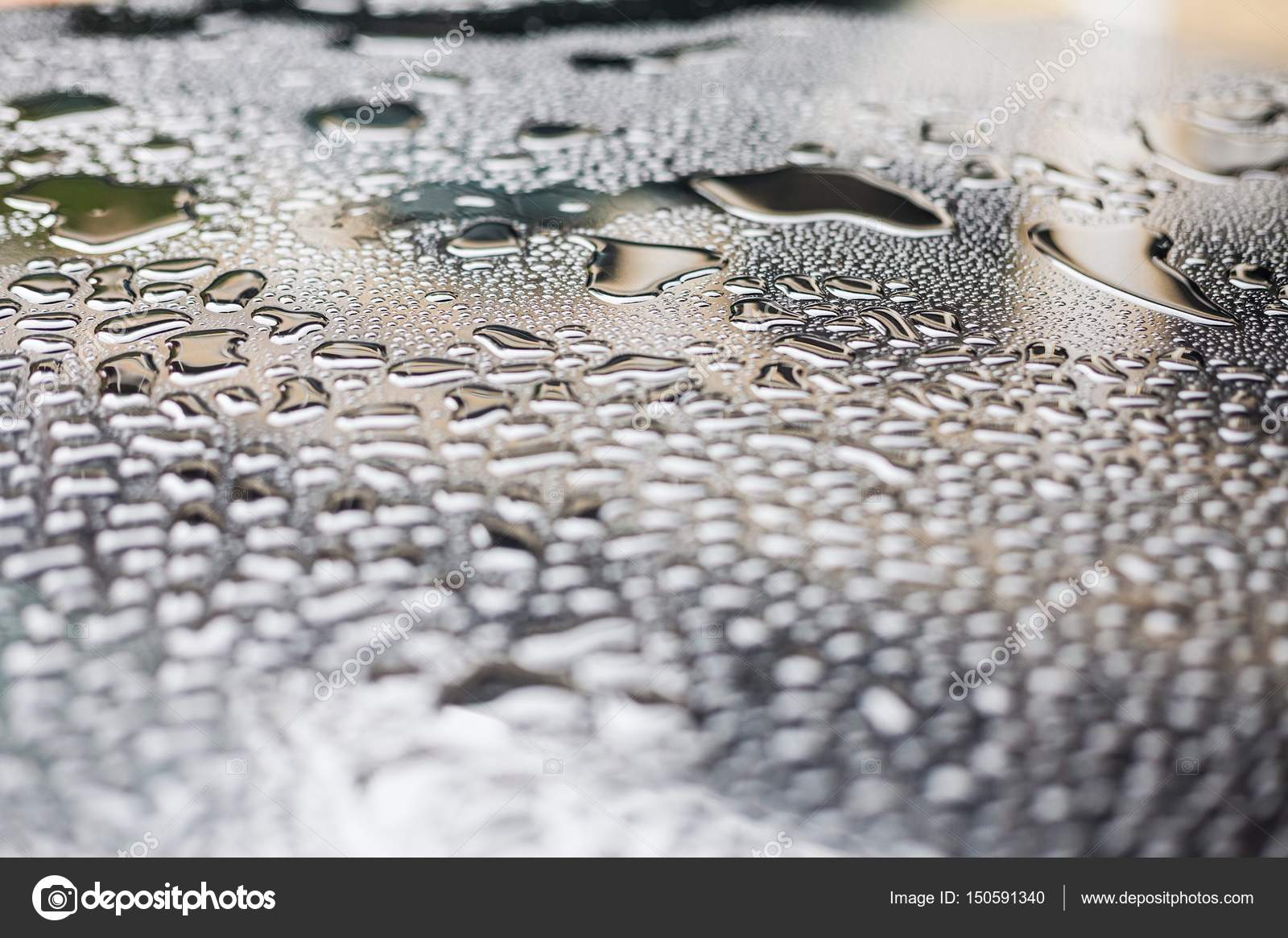 Water Droplets from rain water indicating raining season Stock Photo by ...