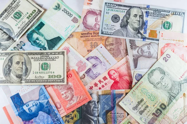 Multiple Currencies banknotes as colorful background showed the global ...