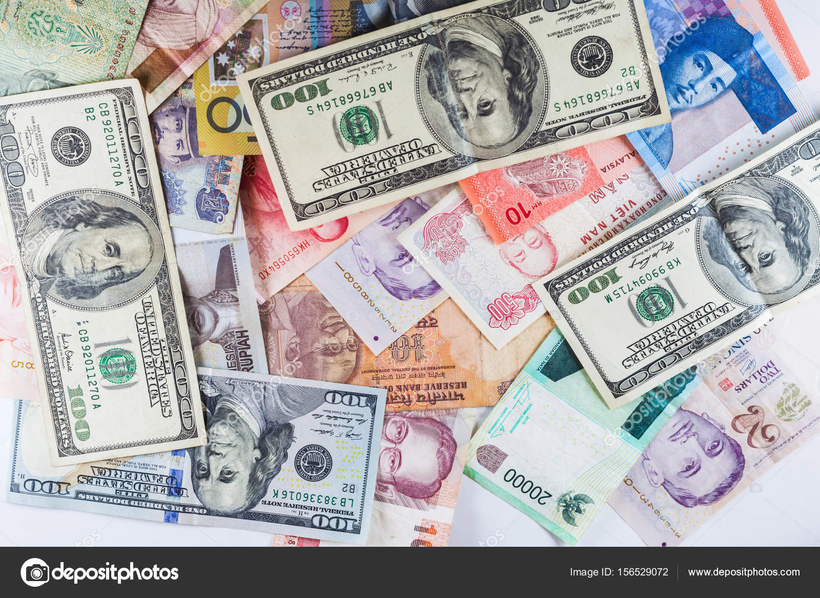 Multiple Currencies banknotes as colorful background showed the global ...
