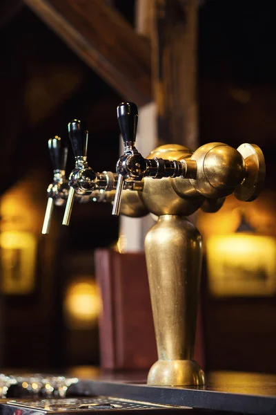 beer tap at the bar.A pub.Bar.Restaurant.Classic.Evening.European ...