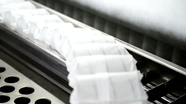 Person puts a block of independent springs in the machine. Stock Video ...