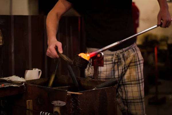 Glassworks glass manufacturing, process of forming a decorative vase ...