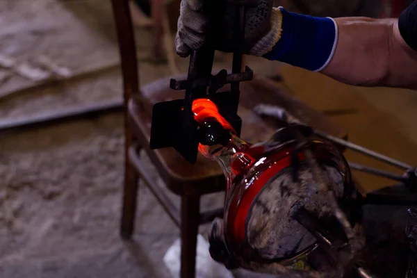 Glassworks glass manufacturing, process of forming a decorative vase ...